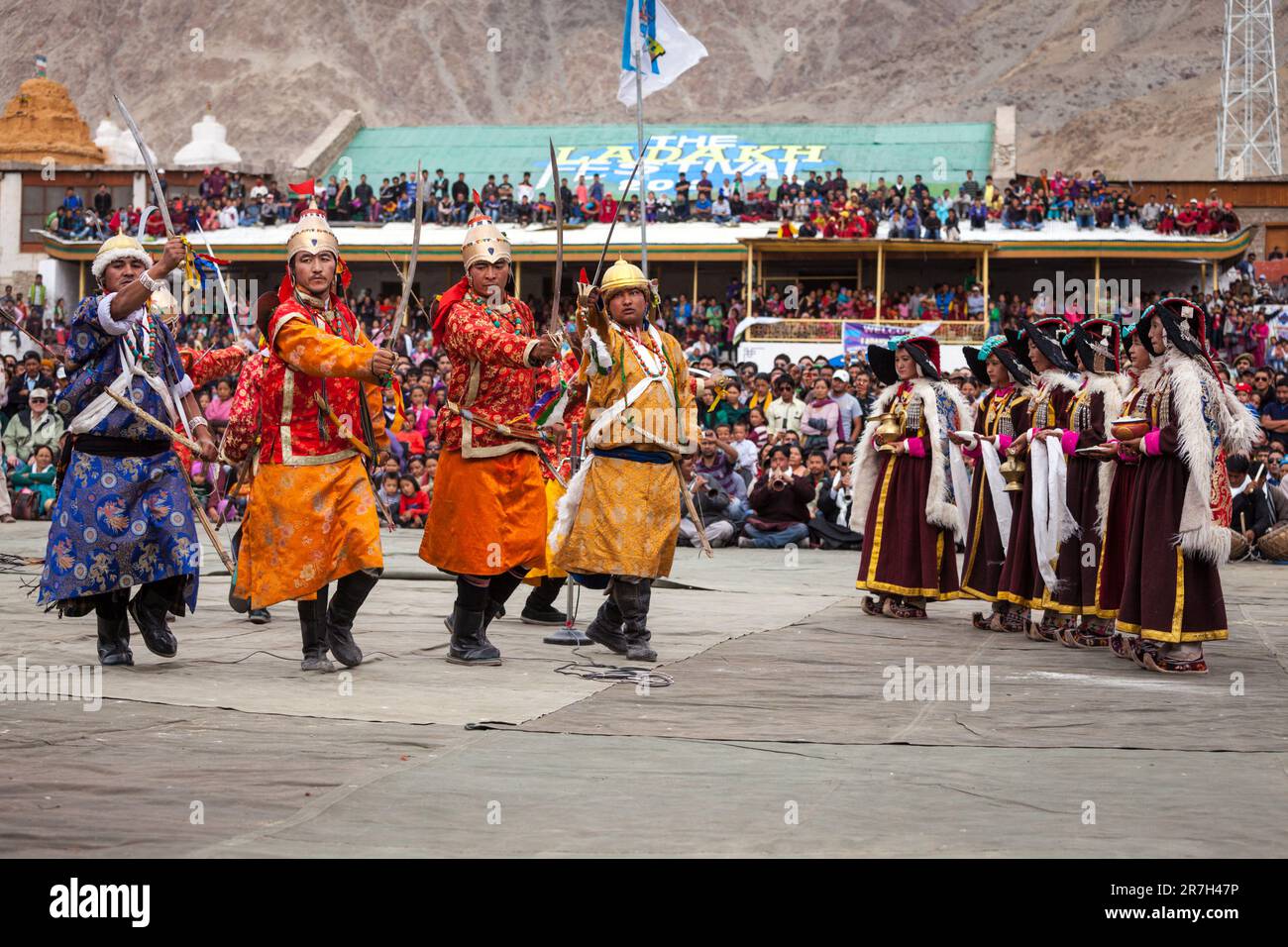 Dancers in traditional Ladakhi Tibetan costumes perform warlike Stock ...