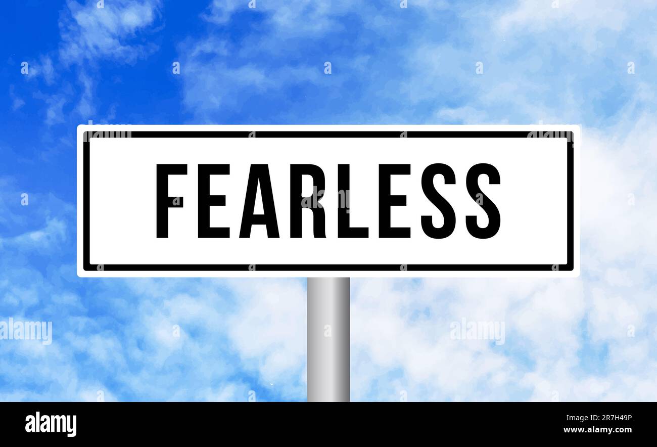 Fearless road sign on cloudy sky background Stock Photo - Alamy