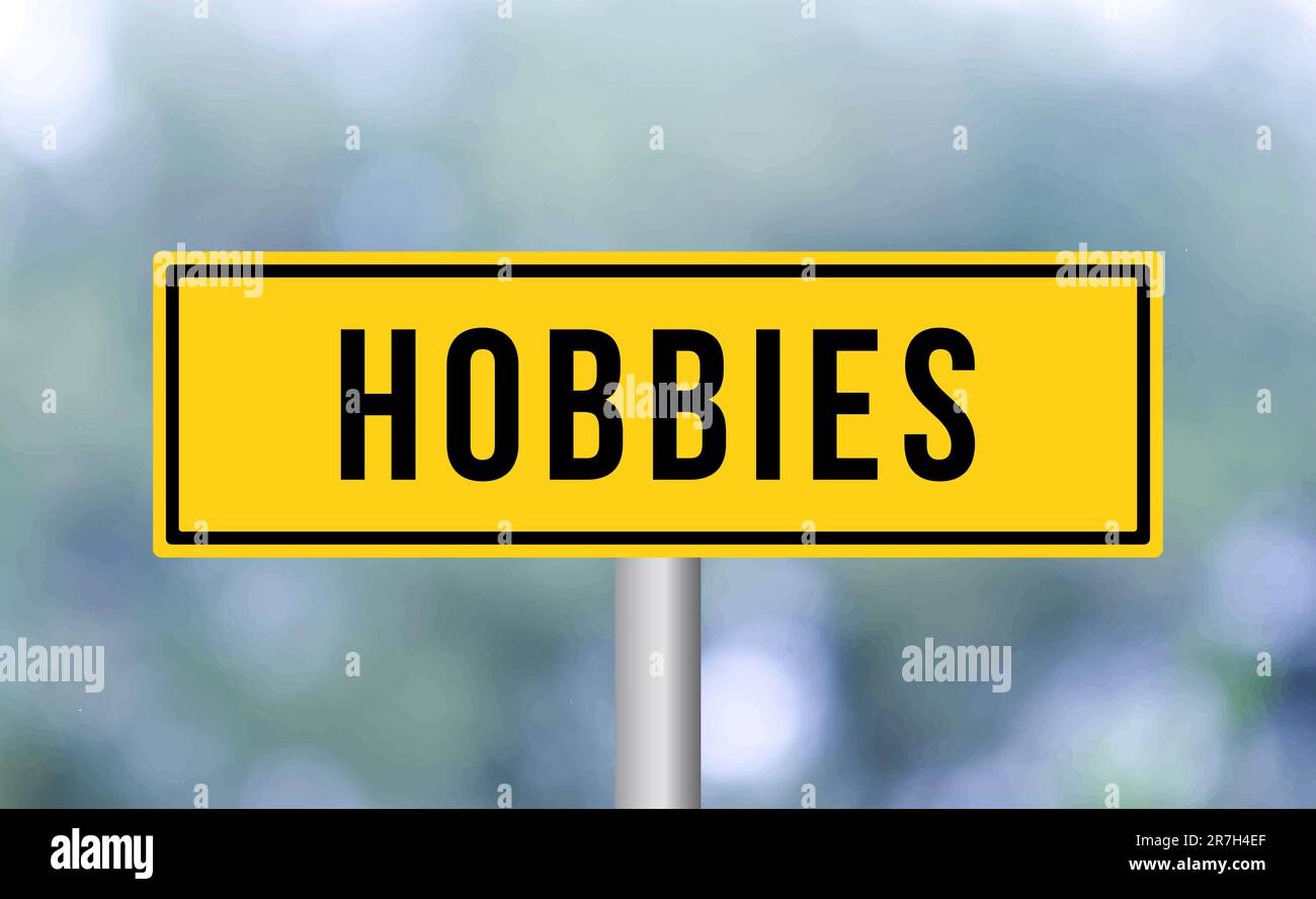 Hobbies road sign on blur background Stock Photo - Alamy