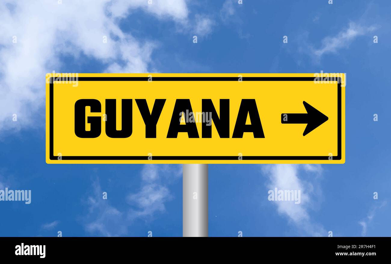 Guyana road sign on sky background Stock Photo - Alamy