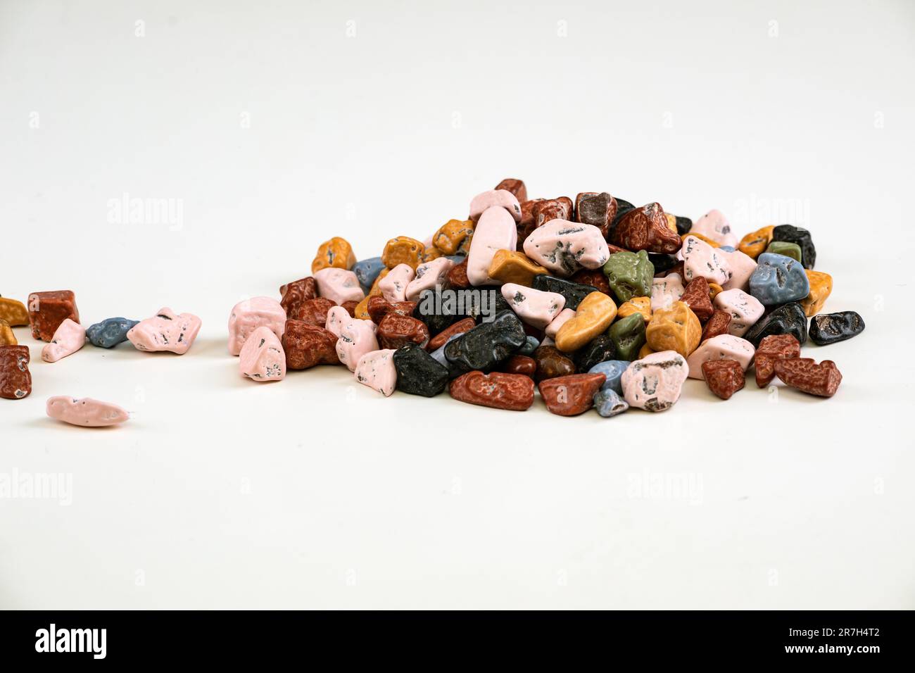 Colorful chocolate candy stones background on white Stock Photo - Alamy