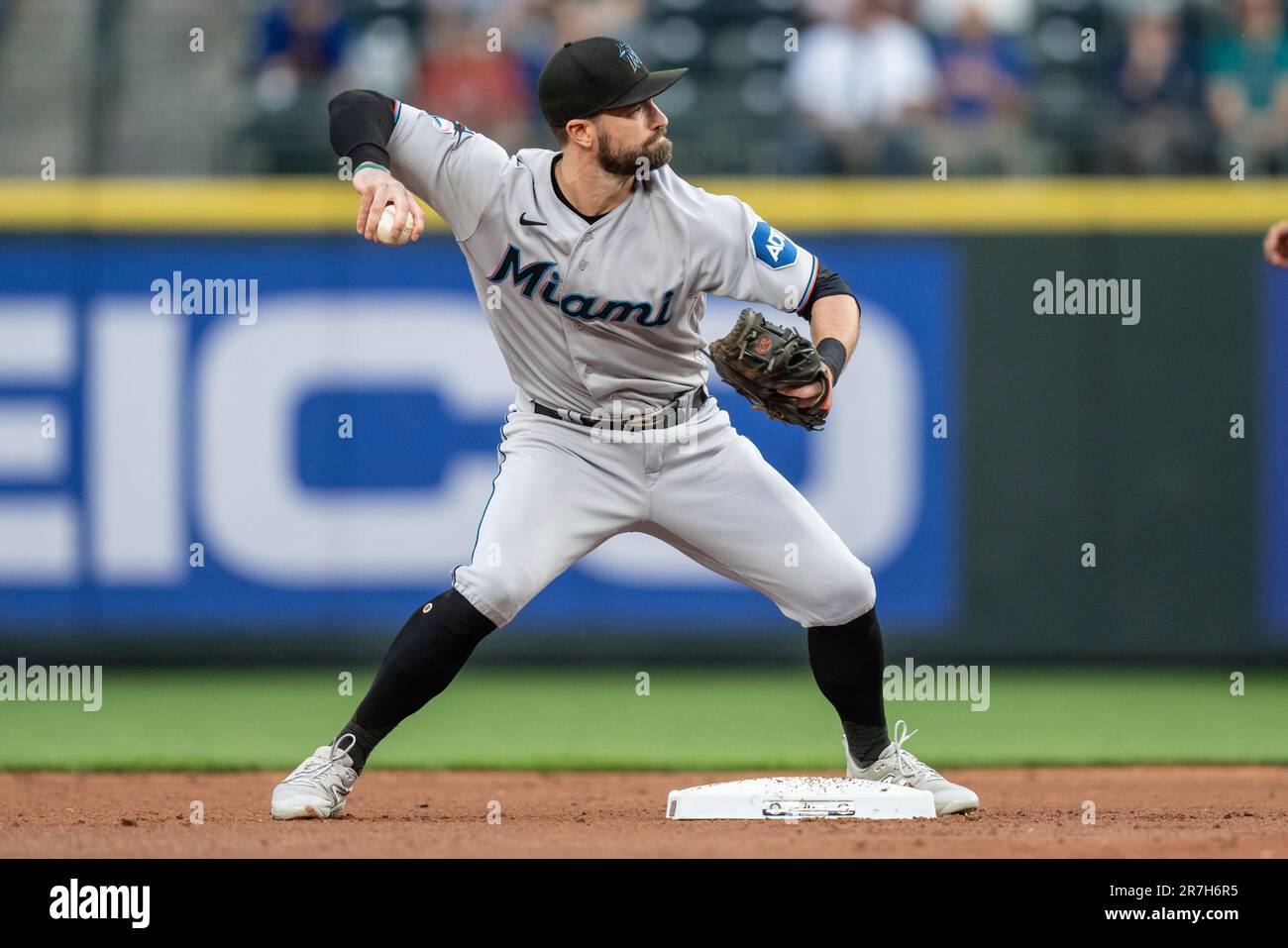 Miami Marlins shortstop Jon Berti attempts to turn a double play after ...