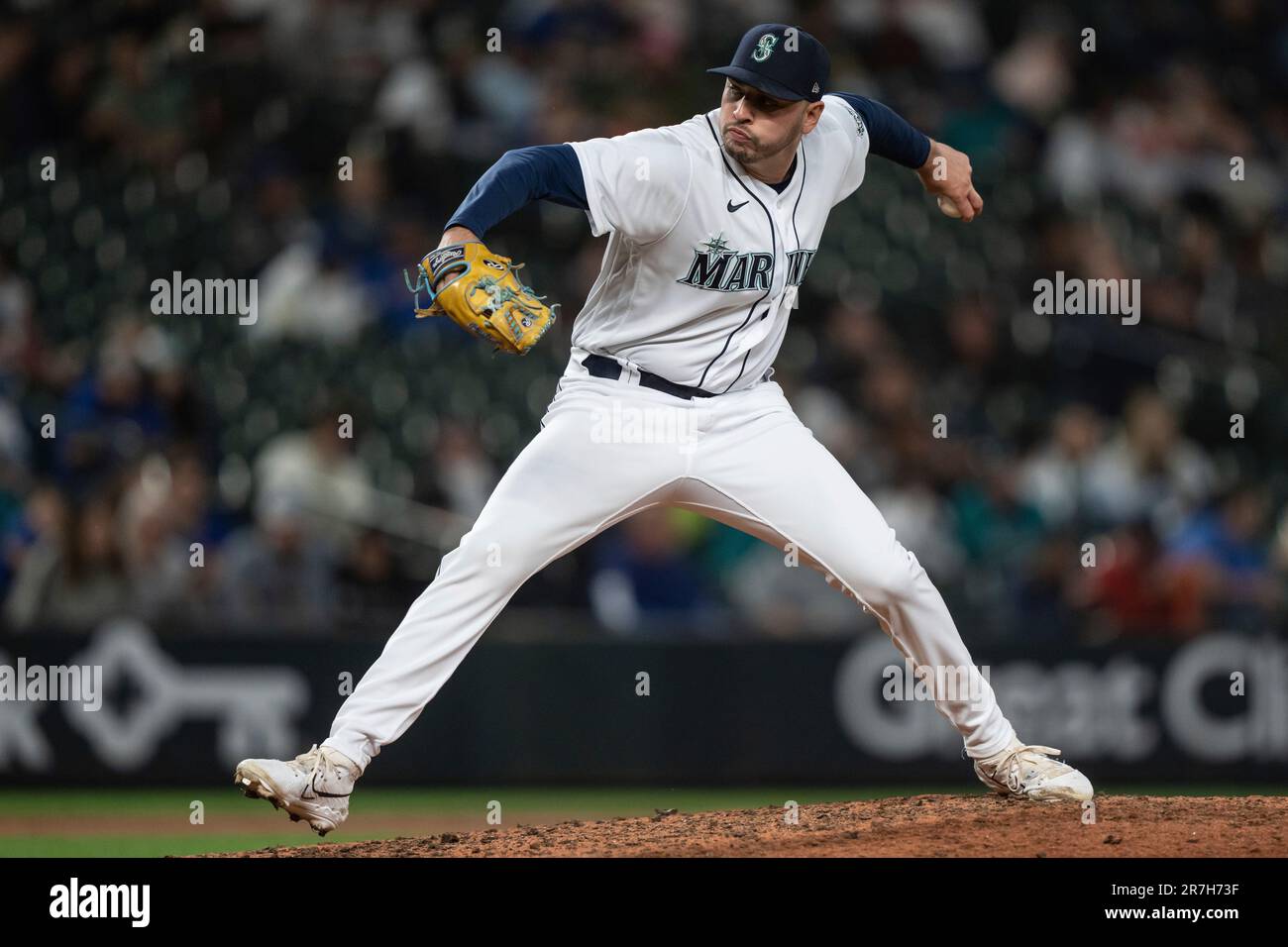 Seattle Mariners reliever Tayler Saucedo delivers a pitch a baseball ...