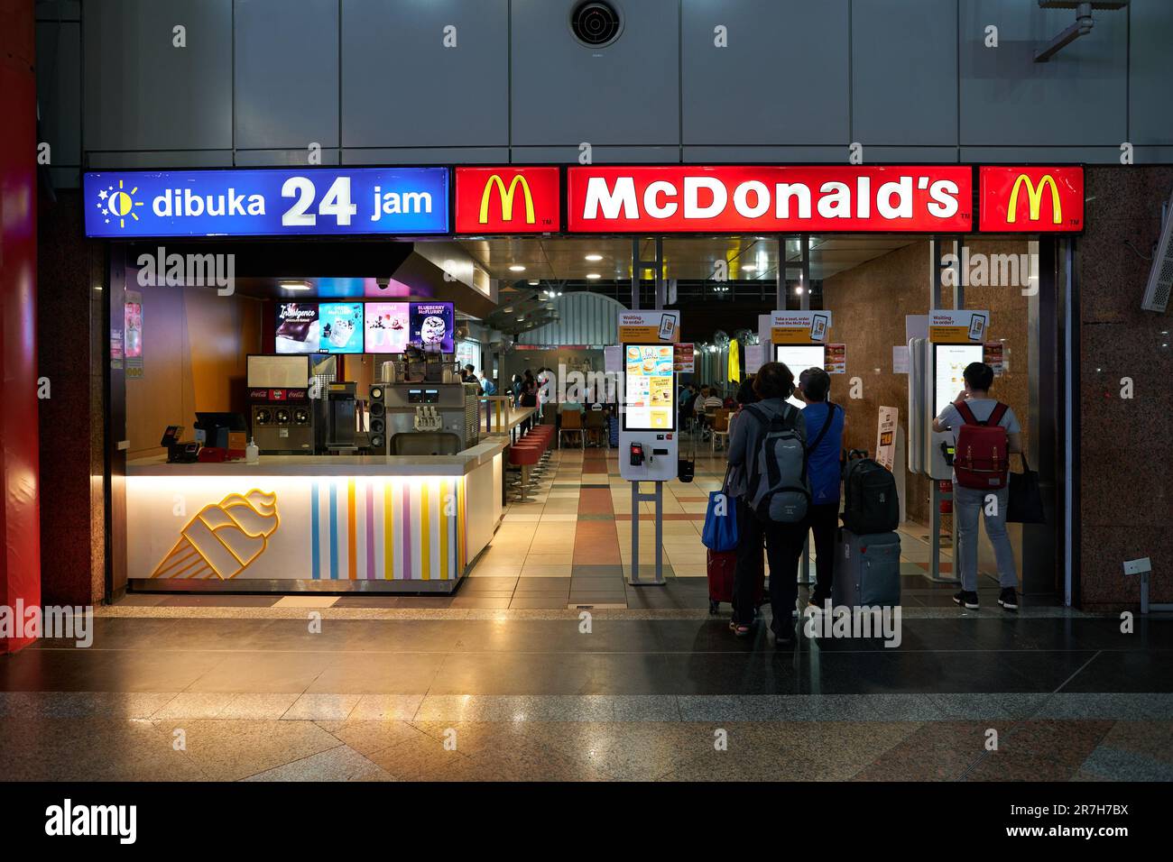 KUALA LUMPUR, MALAYSIA - CIRCA MARCH, 2023: self-service kiosks for placing orders at McDonald's ...