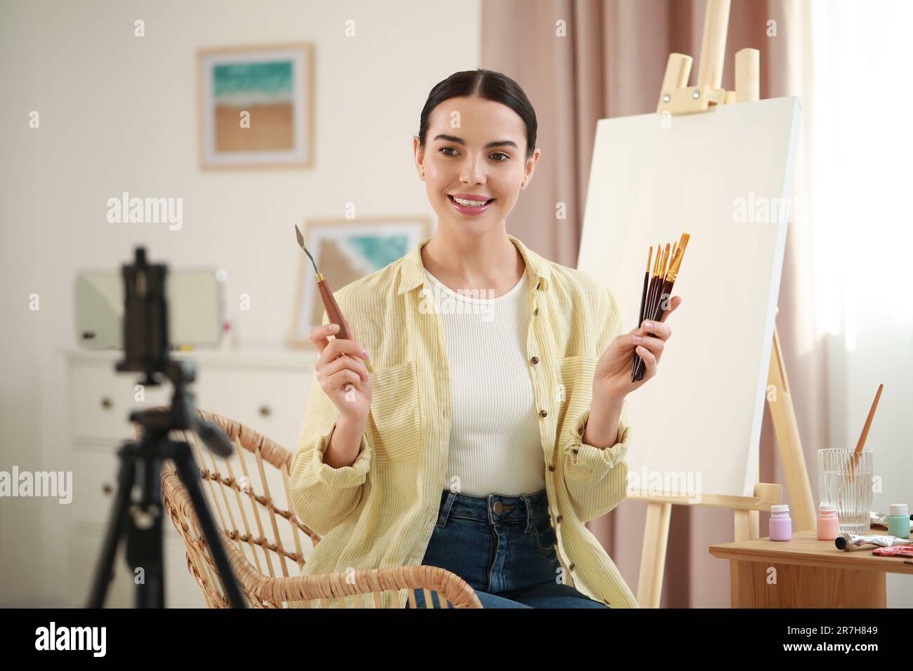 Teacher conducting online painting lesson at home. Time for hobby Stock ...