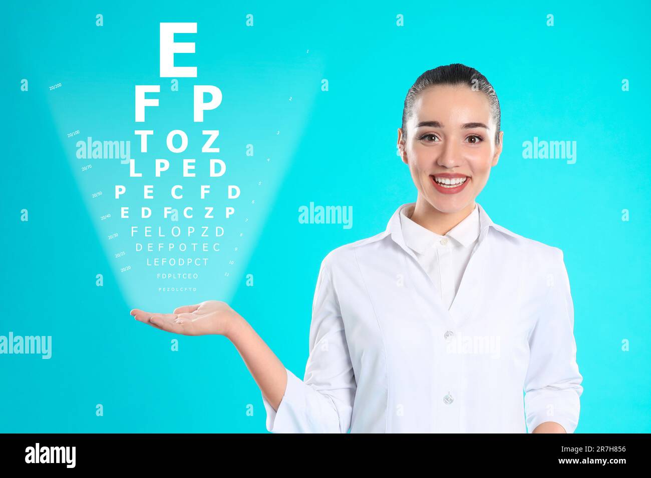 Vision test. Ophthalmologist or optometrist showing eye chart on light ...