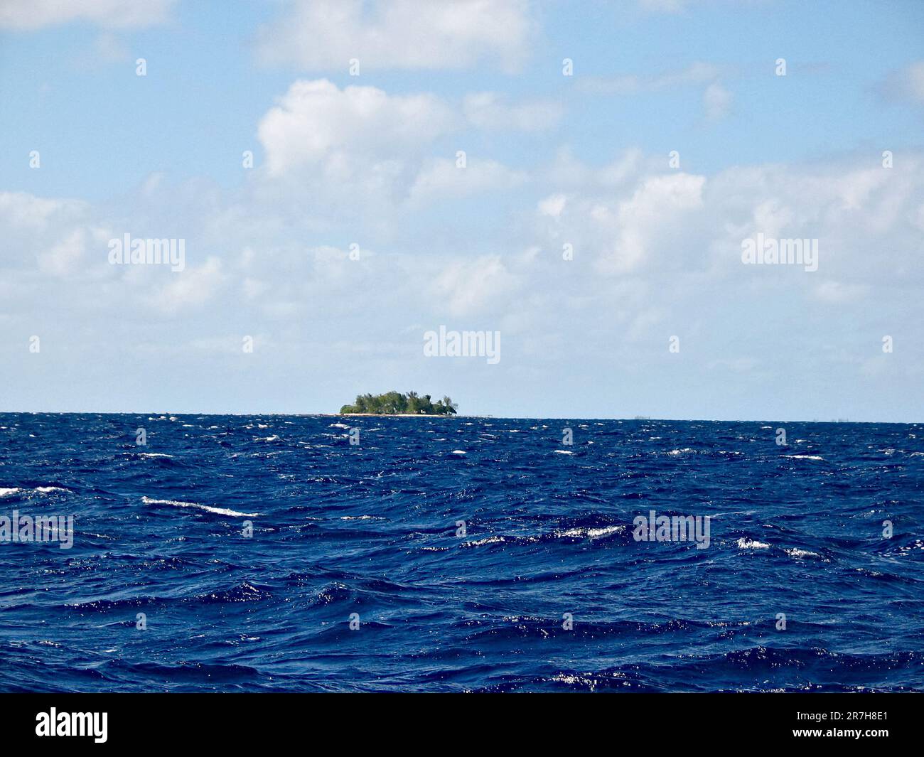 Motu, a small satellite island within an atoll, Polynesia Stock Photo ...