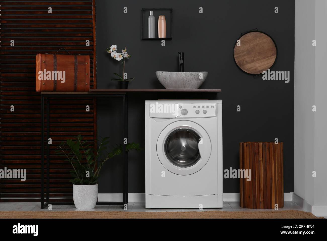 Stylish laundry room with washing machine. Interior design Stock Photo ...