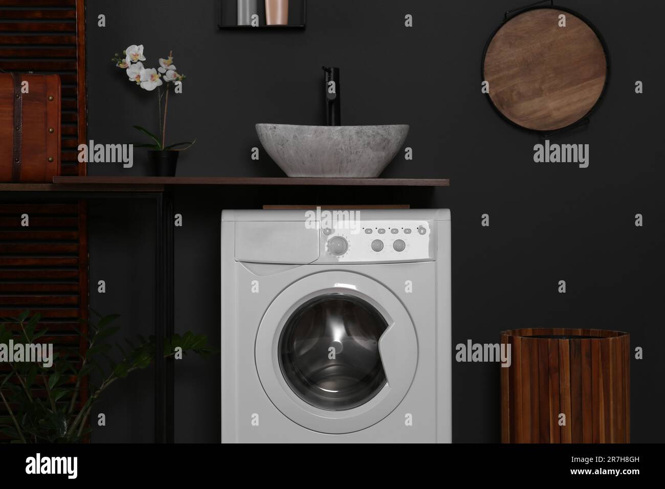 Stylish laundry room with washing machine. Interior design Stock Photo ...