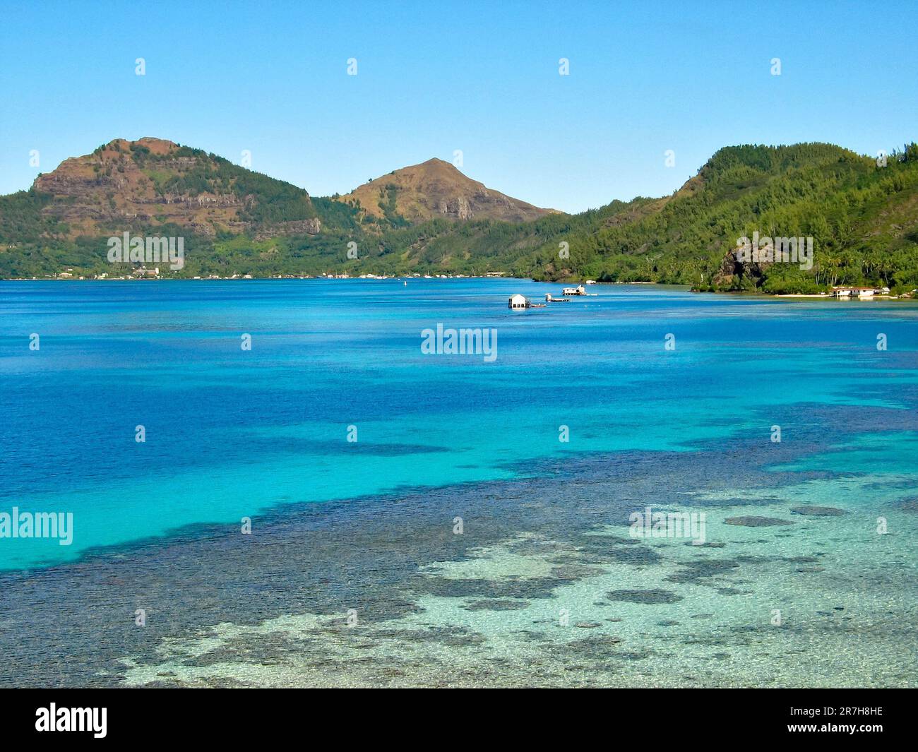 Pearl farms in Polynesia, blue lagoon and green hills Stock Photo - Alamy