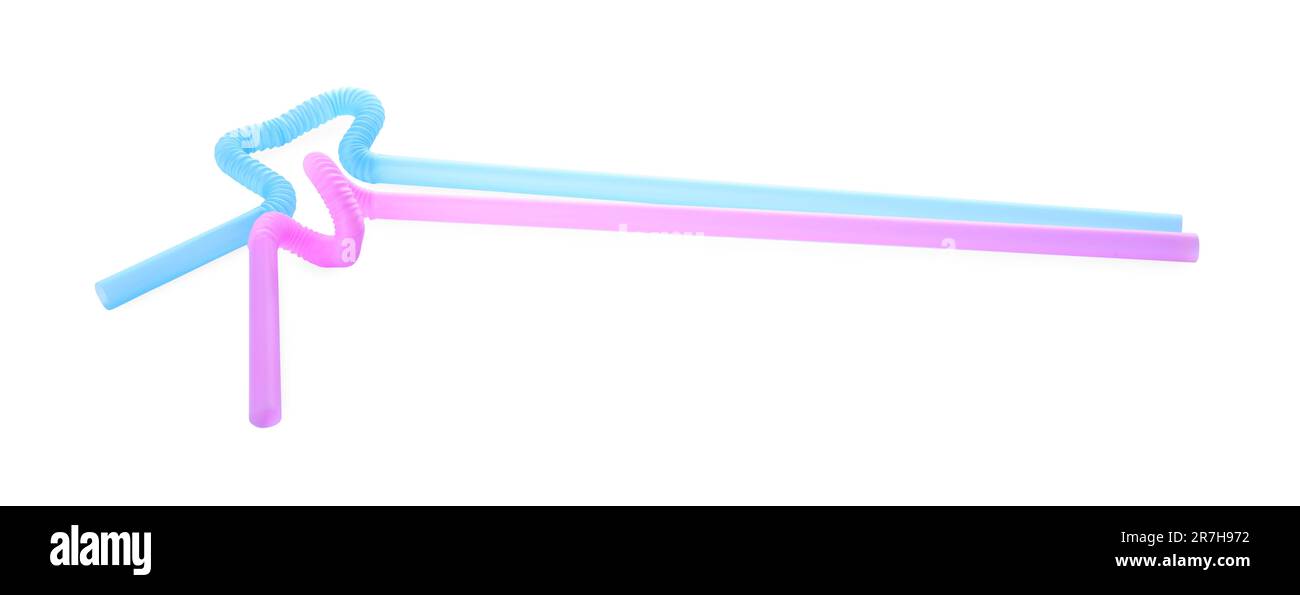 Color plastic cocktail straws on white background Stock Photo - Alamy