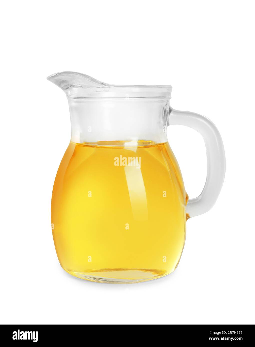 Glass jug of cooking oil isolated on white Stock Photo - Alamy