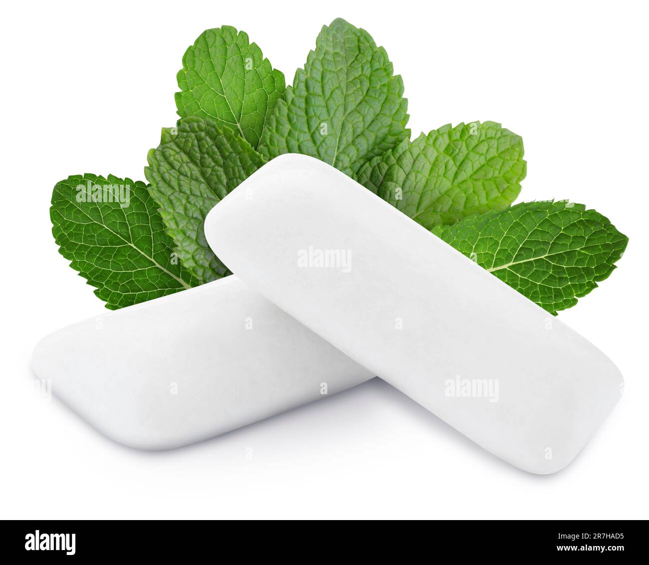 Menthol chewing gum pillows and mint leaves on white background Stock ...