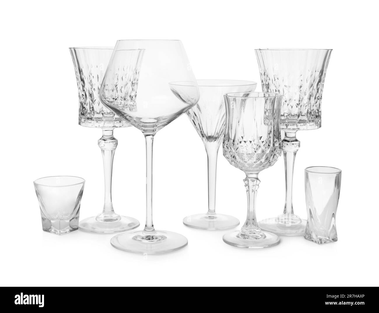 Different elegant empty glasses isolated on white Stock Photo - Alamy