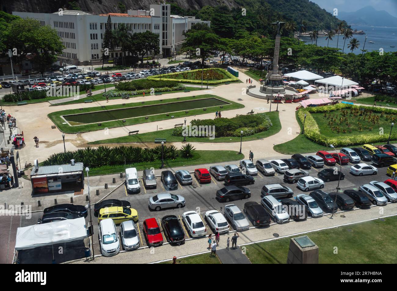 Aerial view of General Tiburcio square with lots of cars parked around ...