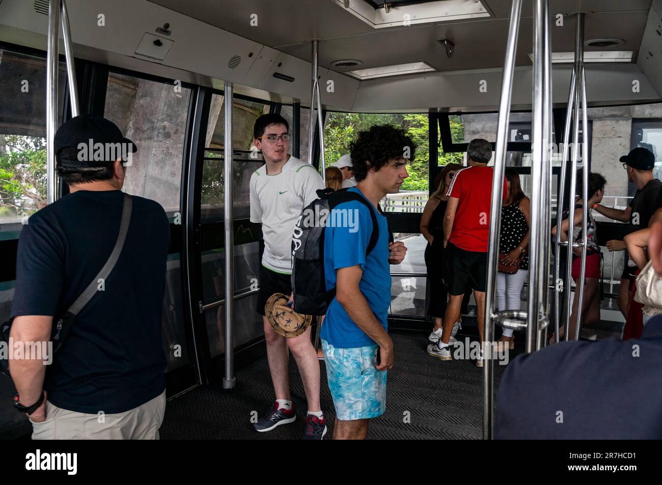 Interior view of Sugarloaf cable car passenger cabin while passengers ...
