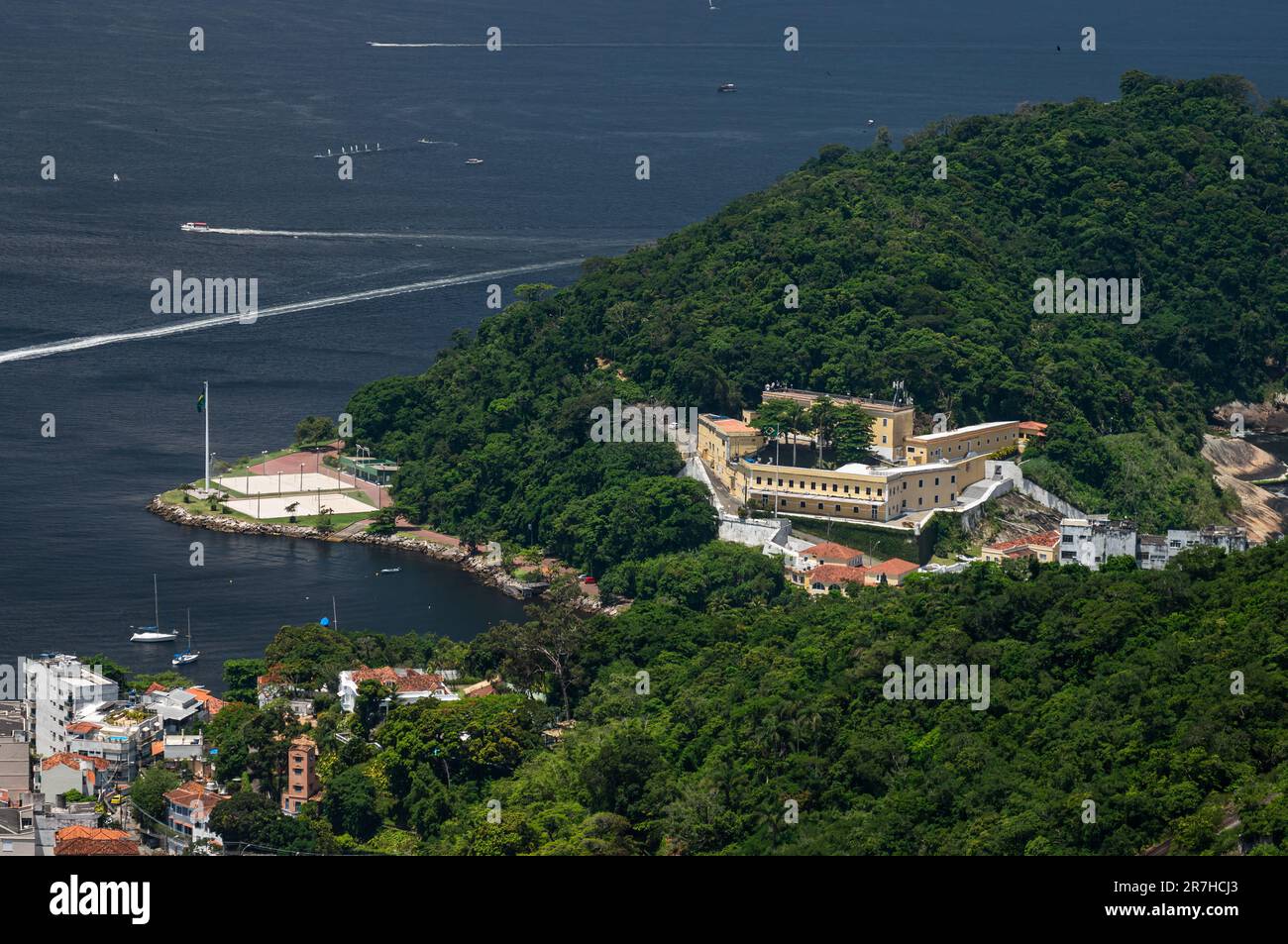 Brazilian army buildings on Cara de Cao hill surrounded by dense green ...