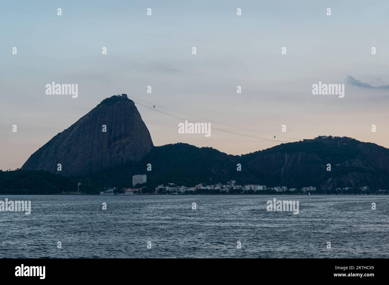 Sugarloaf mountain and Urca hill natural monuments with visible cable ...