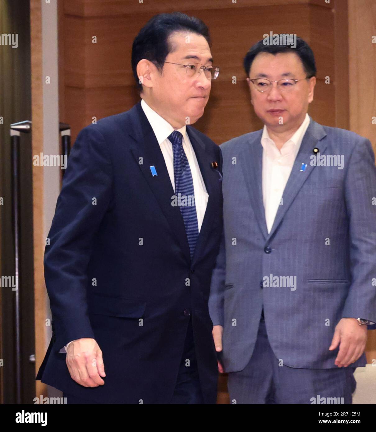 Japanese Prime Minister Fumio Kishida (L) attends a cabinet meeting at prime minister's office ...