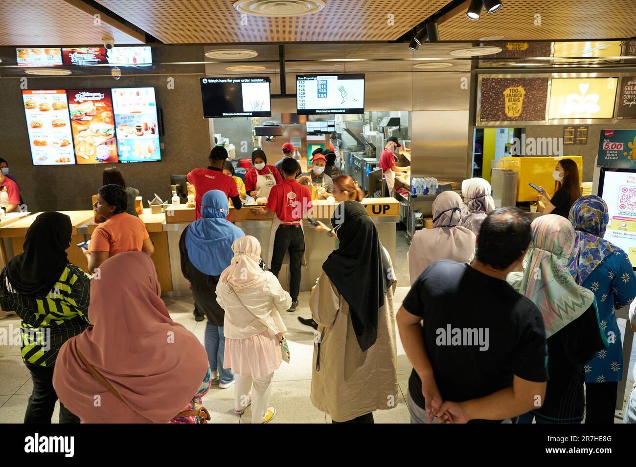 KUALA LUMPUR, MALAYSIA - CIRCA MARCH, 2023: people at McDonald's fast food restaurant in Suria ...