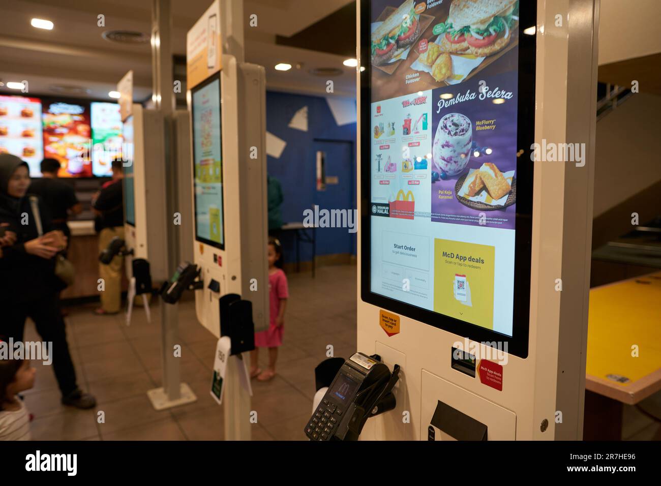 KUALA LUMPUR, MALAYSIA - CIRCA MARCH, 2023: self-service kiosks for ...