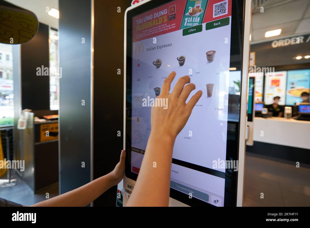 HO CHI MINH CITY, VIETNAM - CIRCA MARCH, 2023: employee use self ...