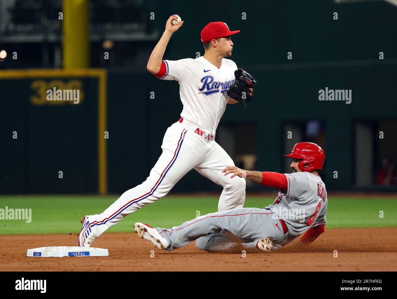 Texas Rangers shortstop Corey Seager throws to first after forcing out ...