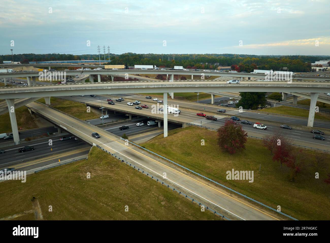 Aerial view of american freeway intersection with fast moving cars and ...
