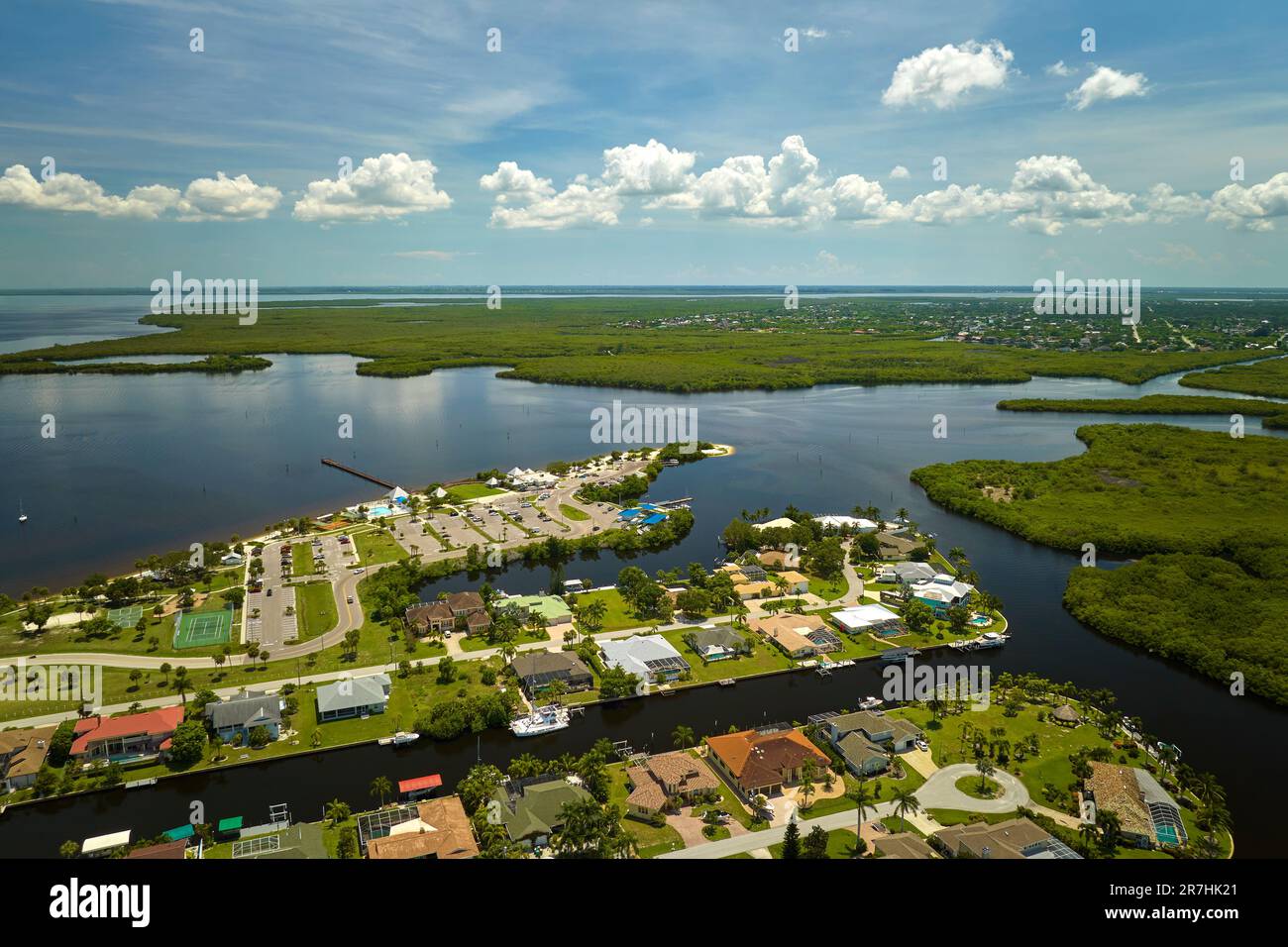 Aerial view of rural private houses in remote suburbs located near ...