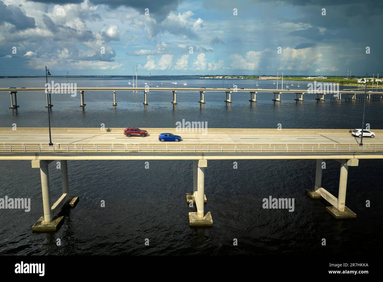 Barron Collier Bridge and Gilchrist Bridge in Florida with moving ...