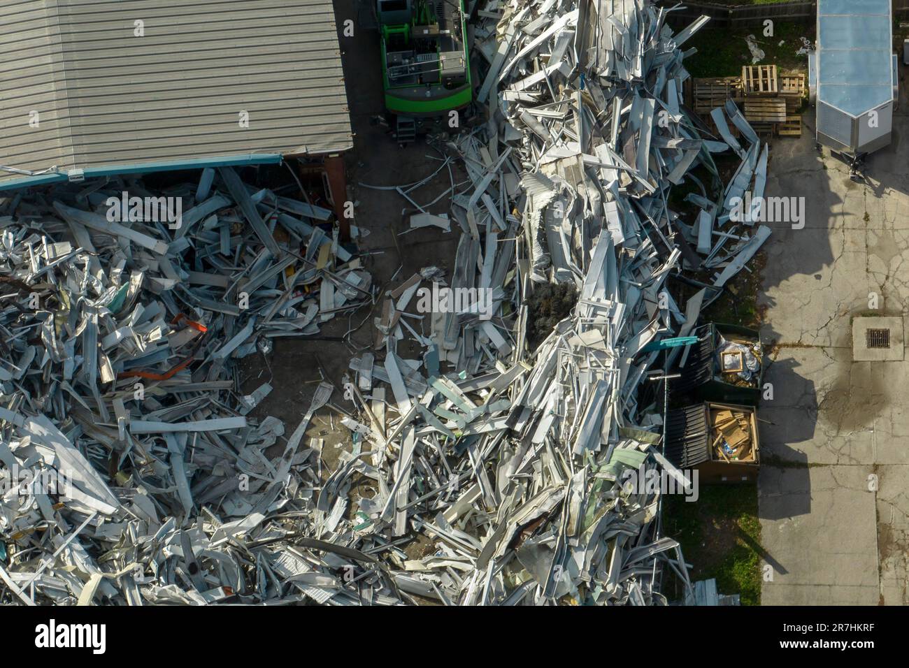 Beg pile of scrap aluminum metal siding from ruined houses after ...