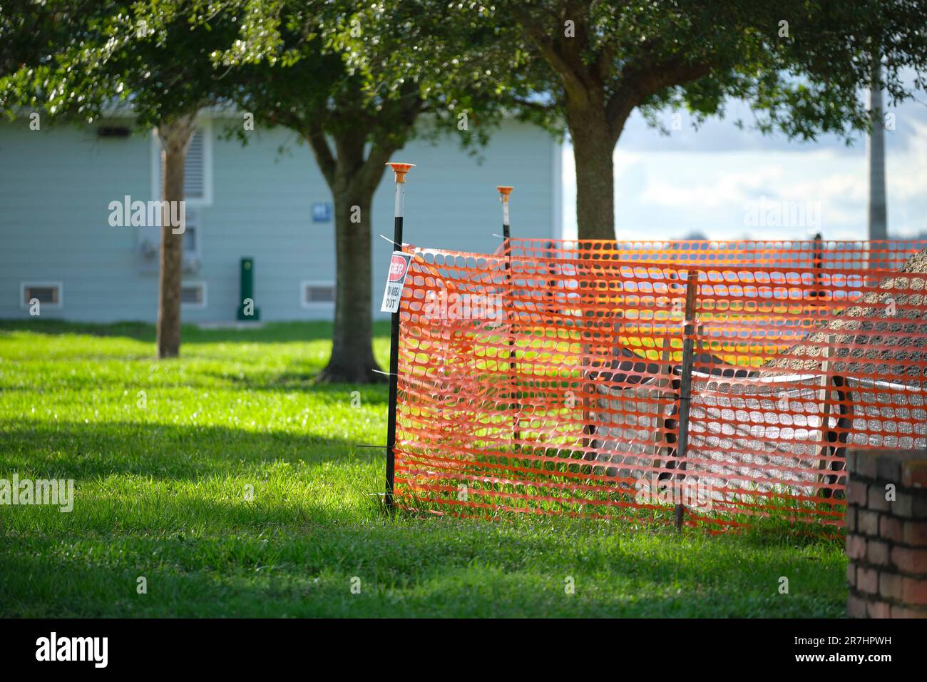 Restriction plastic mesh fence at industrial construction site ...