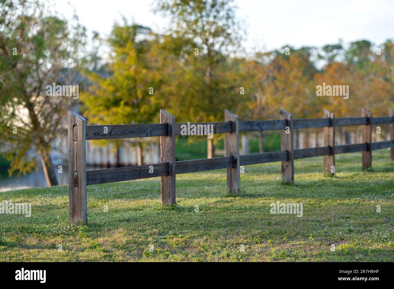 Wooden fence barrier at farm grounds for cattle and territory ...