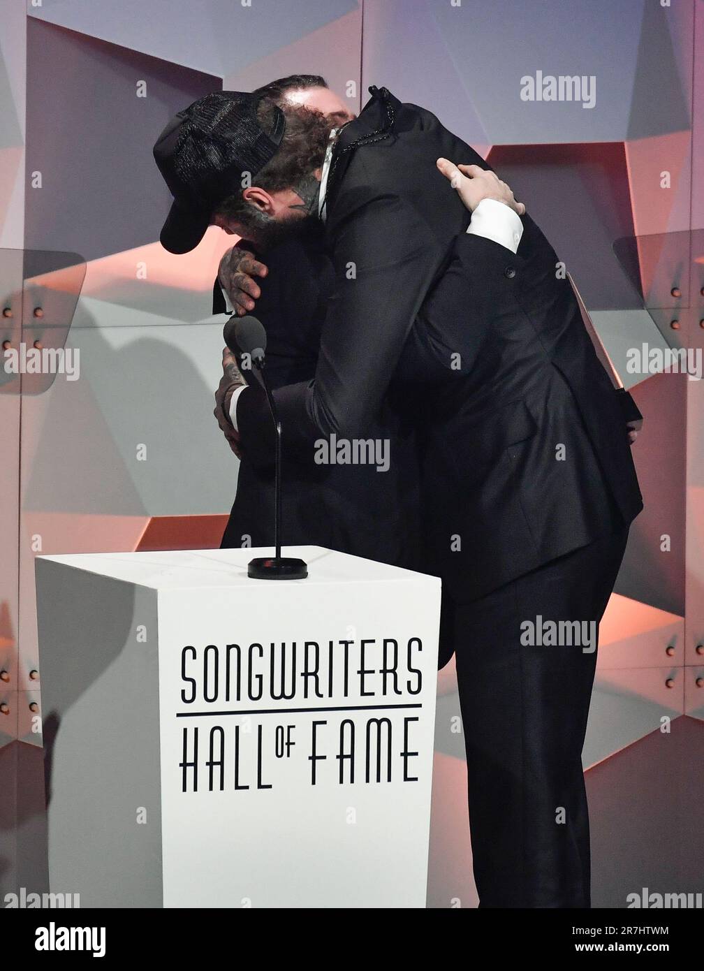 Post Malone accepts the Hal David Starlight award from Louis Bell at the 52nd annual Songwriters ...
