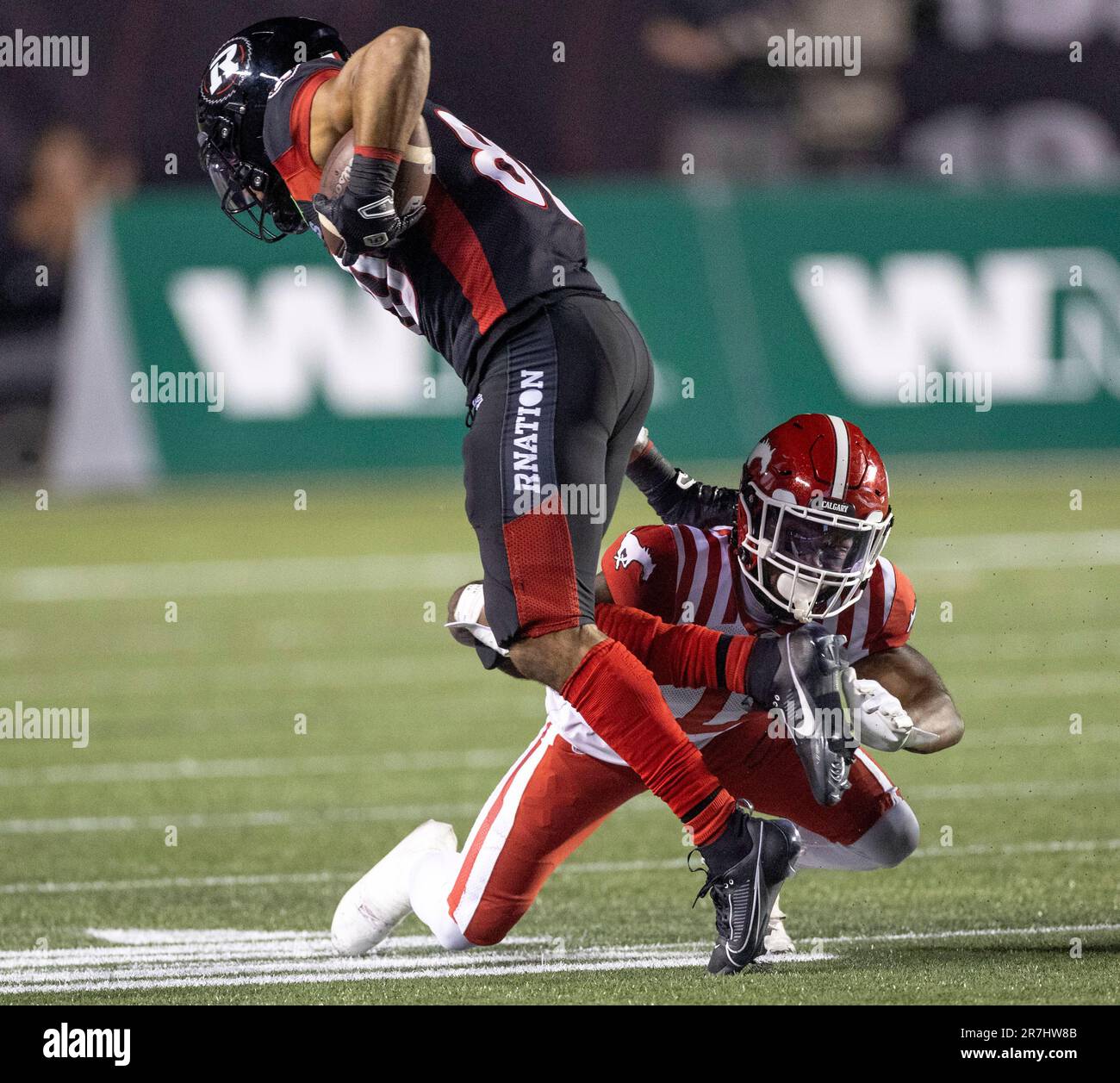 (Ottawa, Canada---15 June 2023) Kobe Williams (0) of the Calgary ...