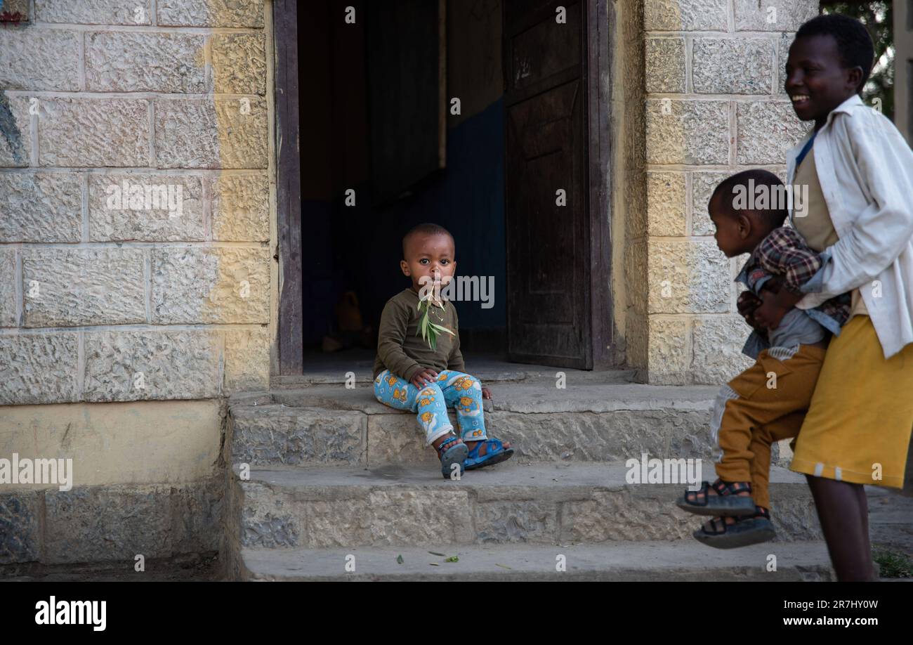 Mekele, Ethiopia. 15th May, 2023. A baby seen sitting on the stairs of ...