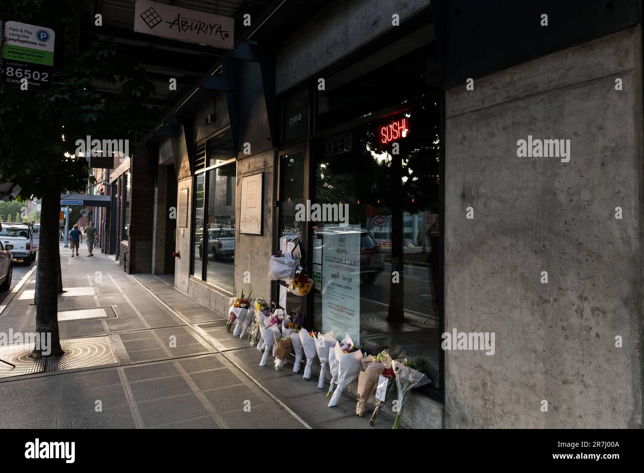 Seattle, USA. 15 Jun, 2023. The memorial outside the closed Aburiya ...