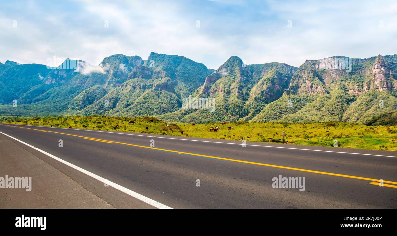 The hilly rural area and asphalt road Stock Photo - Alamy
