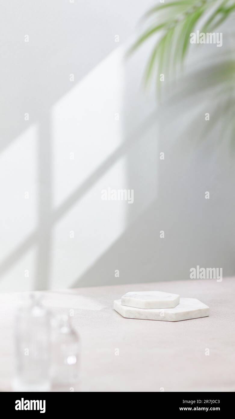 Vases and objects on the table in a warm room with sunlight coming in ...