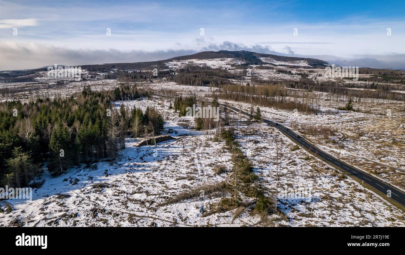 An aerial view of the winter landscape featuring snow-covered hills in ...