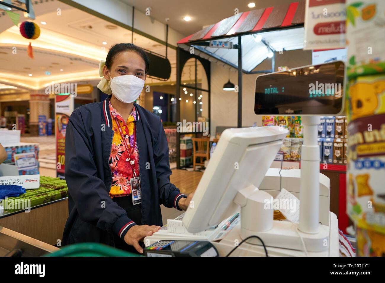 PATTAYA, THAILAND - CIRCA APRIL, 2023: indoor portrait of cashier at ...