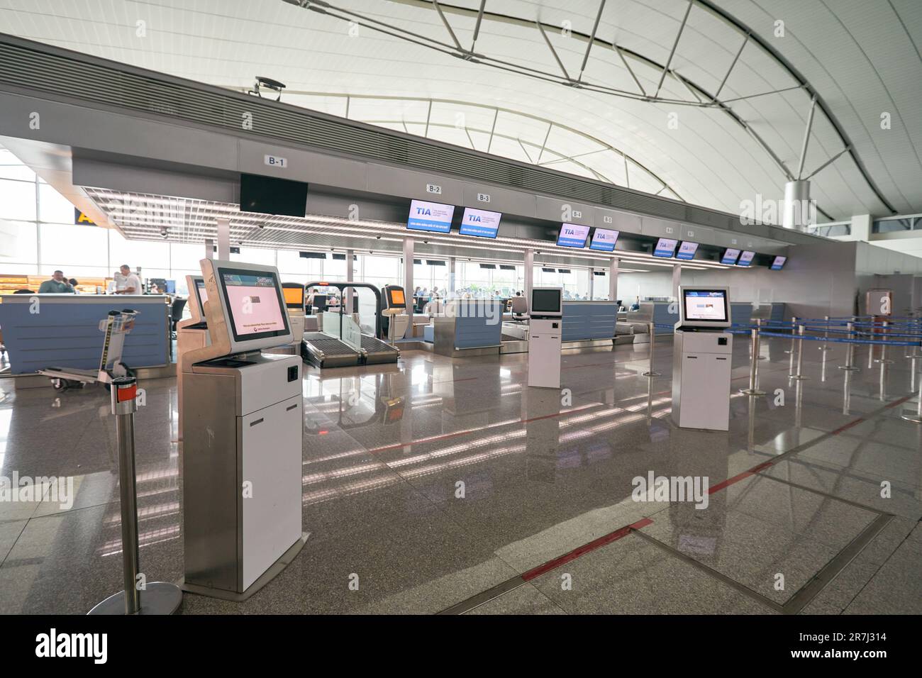 HO CHI MINH CITY, VIETNAM - CIRCA MARCH, 2023: self-check-in kiosks at ...