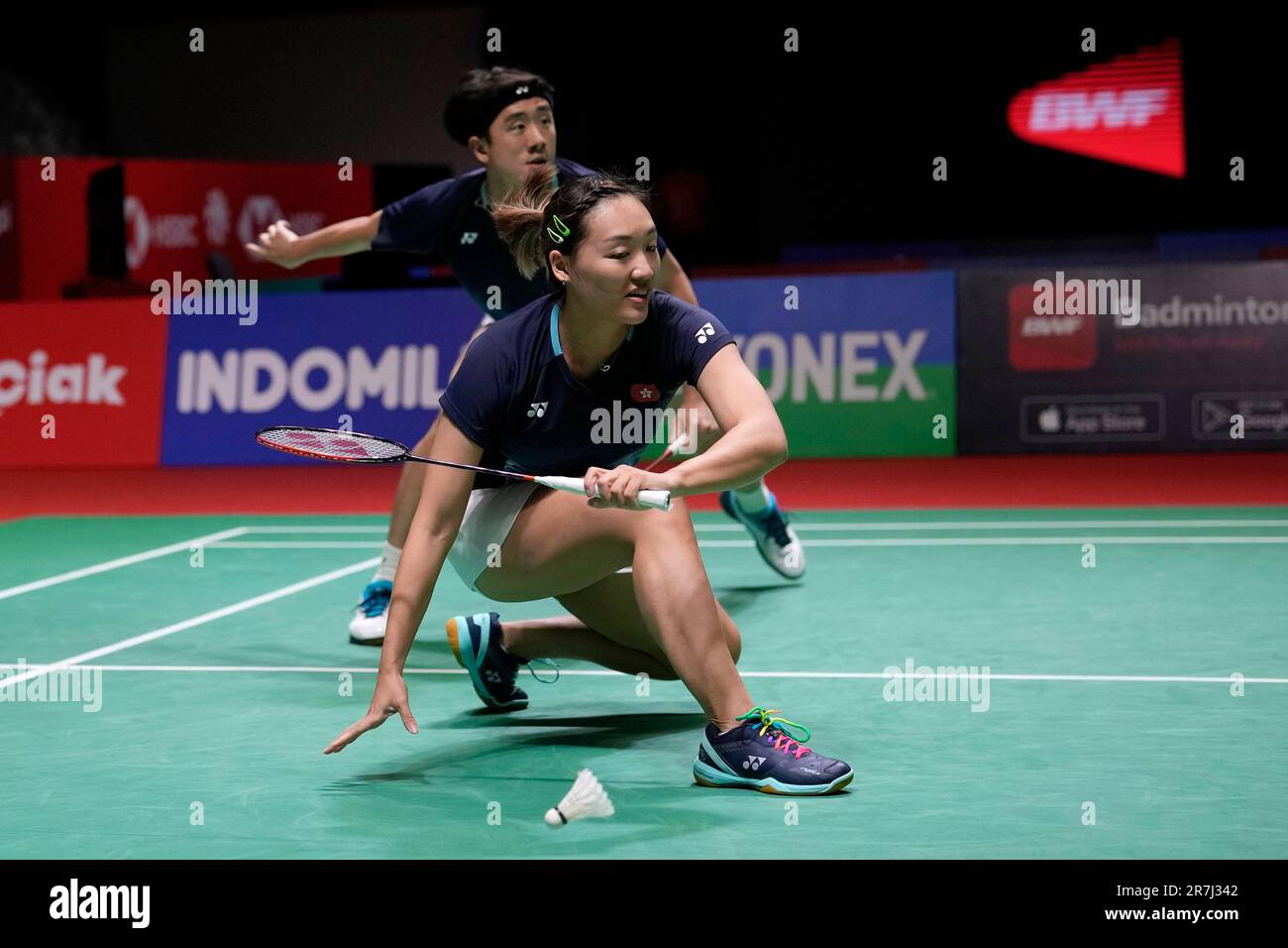 Hong Kong's Tang Chun Man and Tse Ying Tsuet, front, play against ...