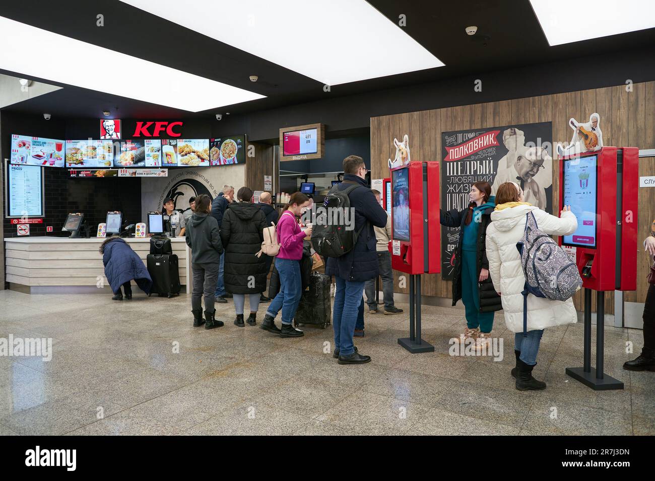 MOSCOW, RUSSIA - CIRCA JANUARY, 2023: people use self-ordering kiosks ...