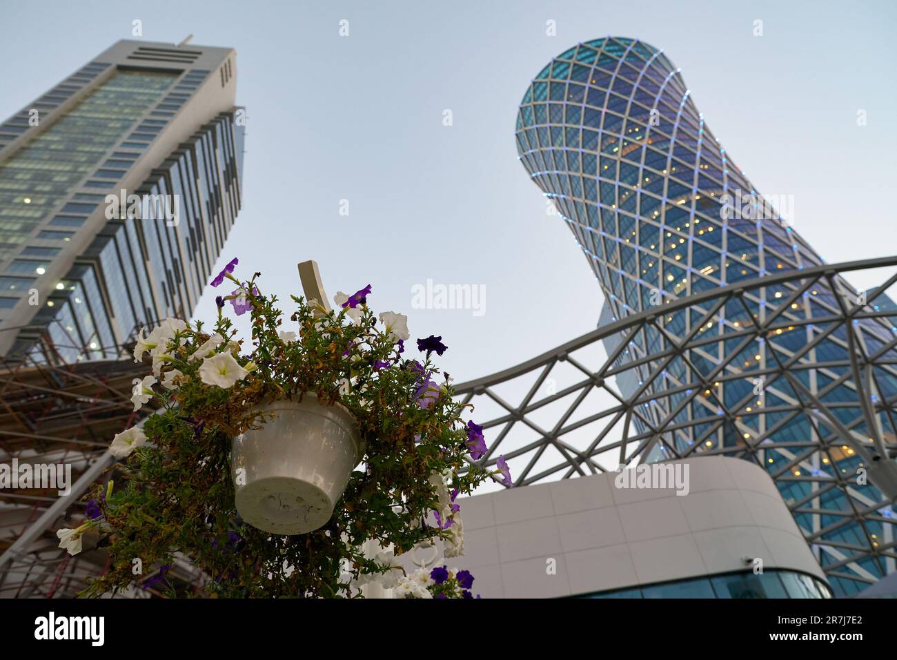 DOHA, QATAR - CIRCA MARCH, 2023: flowers with Tornado Tower in the ...