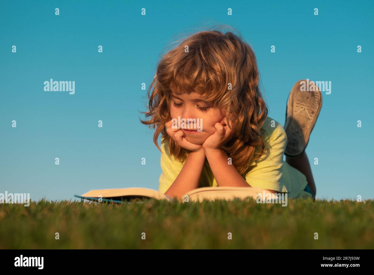 Kids adventure, freedom and carefree children. Cute kid reading book ...
