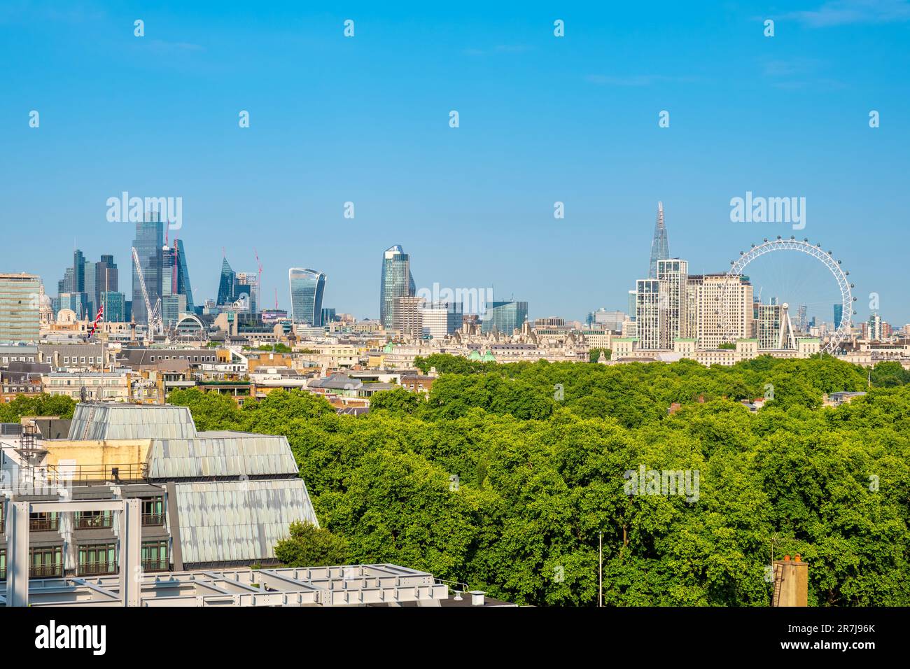 View to London Skyline over greenery of the park. London, England Stock ...