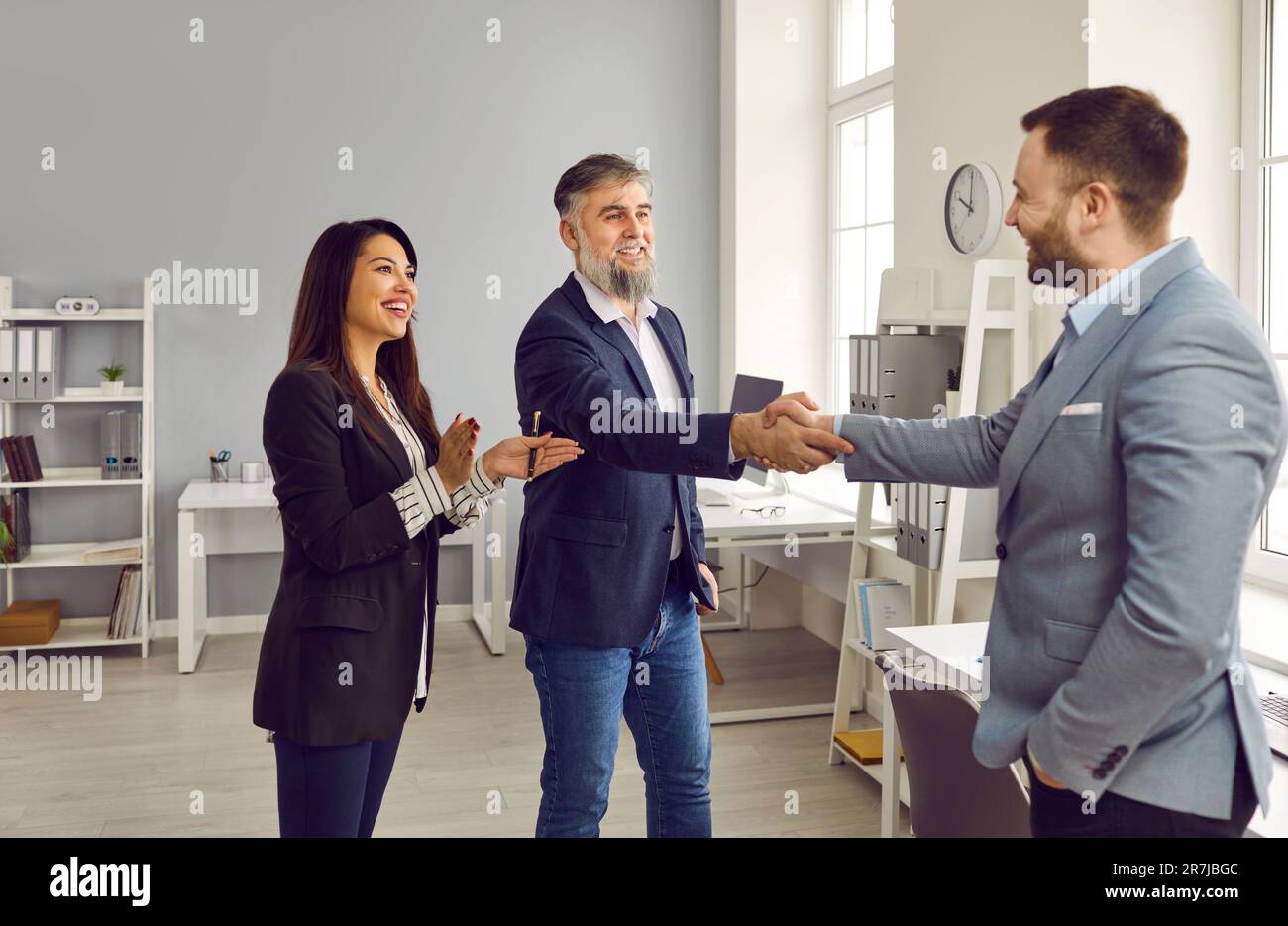 Business partners shaking hands celebrating hi-res stock photography ...