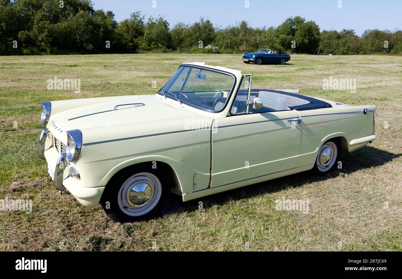 Side view view of a Cream, 1961, Triumph Herald Convertible, on display ...