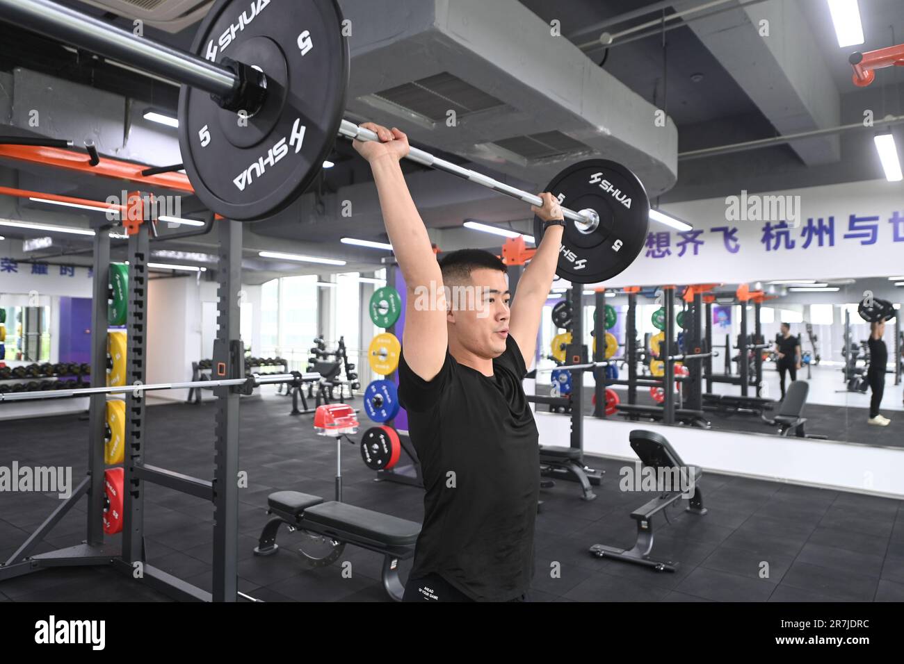 Hangzhou, China's Zhejiang Province. 16th June, 2023. A coach lifts a ...